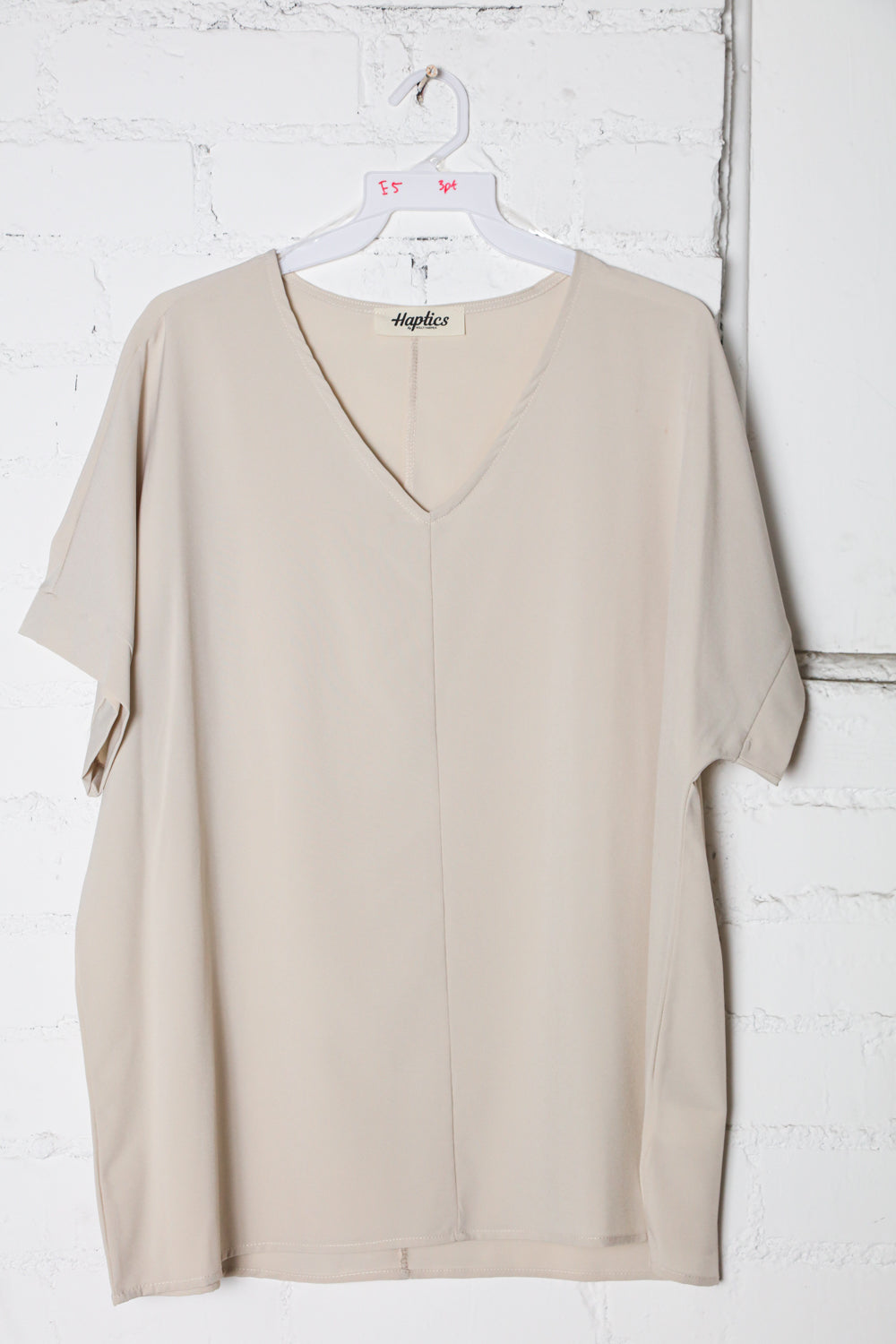 Stone Drop Shoulder Dolman Stretched Woven Top